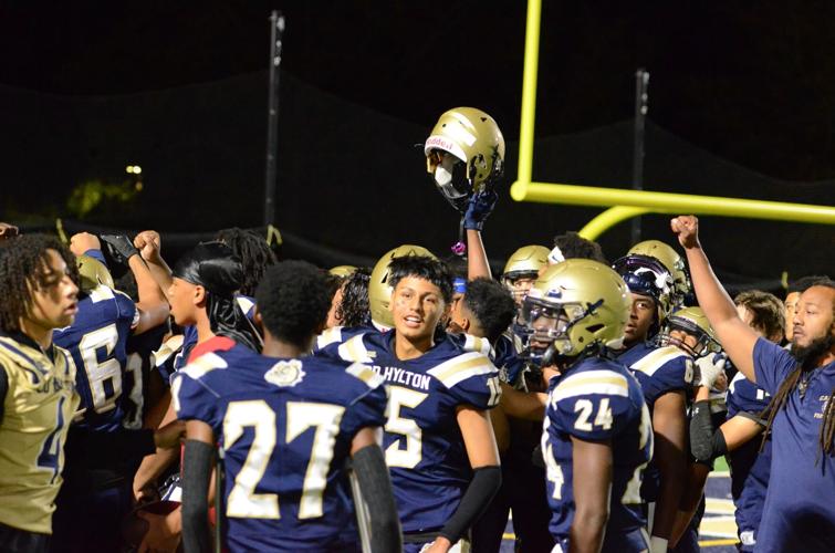 PHOTOS: Hylton football wins third straight | Sports | insidenova.com