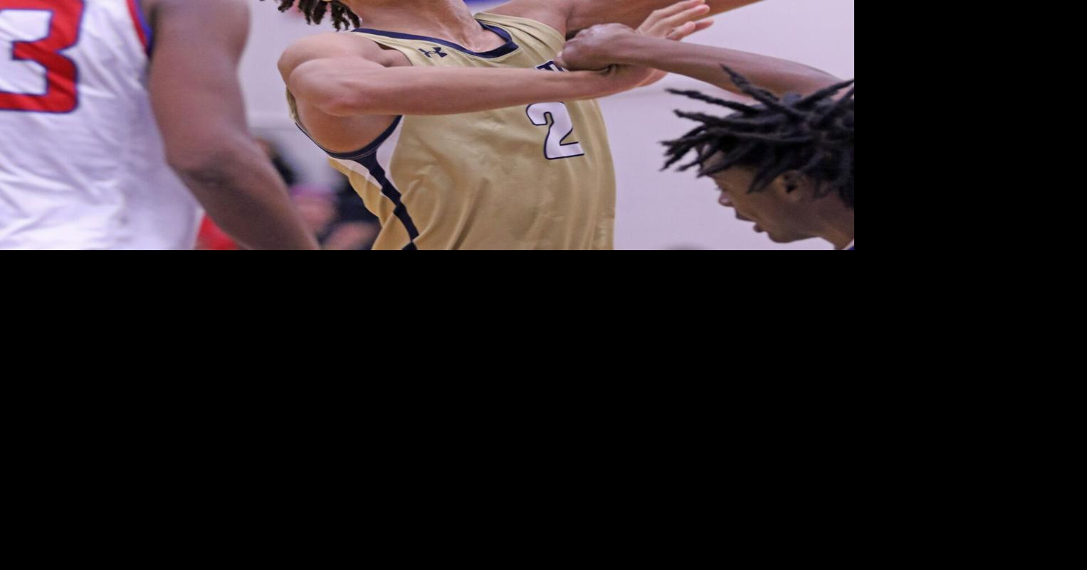 Hylton boys basketball clamps down on Gar-Field | Prince William ...