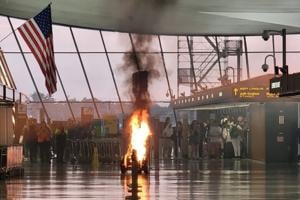 Police officers injured, terminal evacuated after segway fire at Dulles ...
