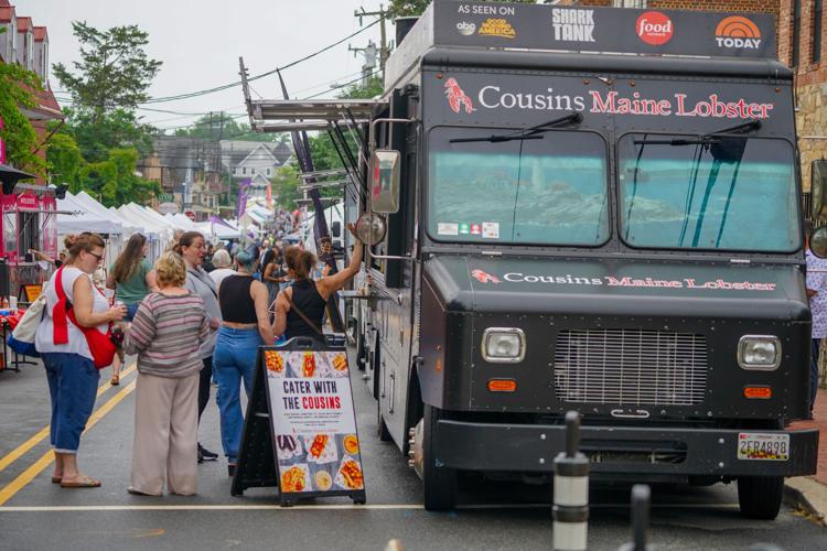 IN PHOTOS: A rainy scene at annual Occoquan RiverFest and Craft Show ...