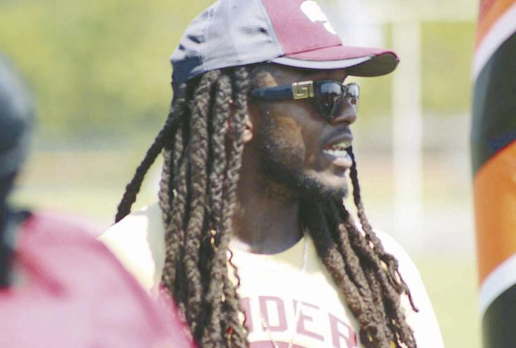 Osbourn graduate Brandon Hogan returns to high school football as a ...