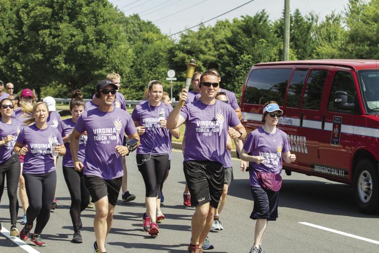 Torch run through Woodbridge supports Special Olympics | Woodbridge ...