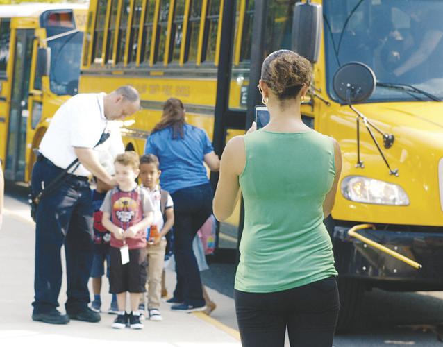 Firefighters welcome students at Kyle Wilson Elementary | Prince ...