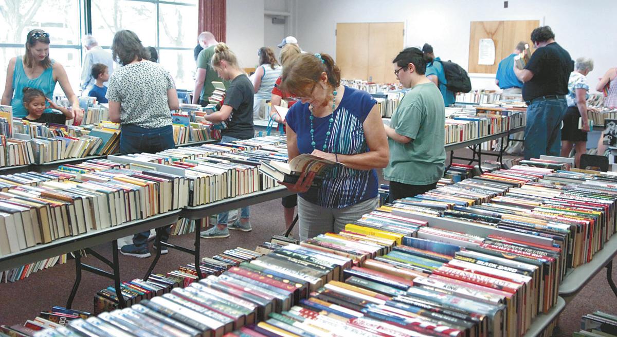 Finding hidden treasures at Chinn Park library book sale | Lake Ridge ...