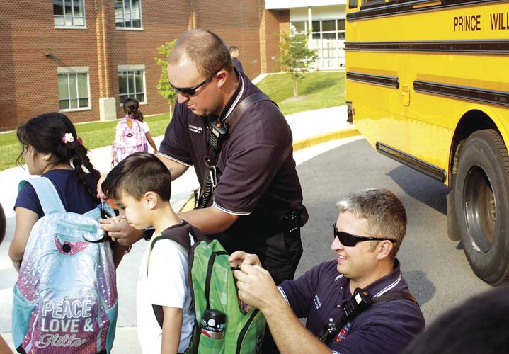 Firefighters welcome students at Kyle Wilson Elementary | Prince ...