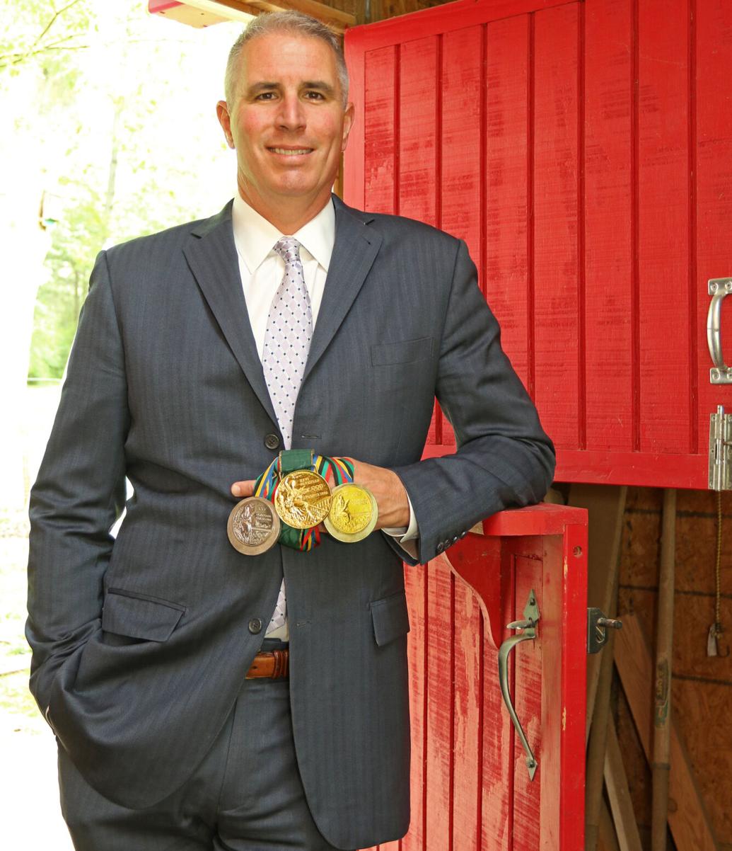 Twenty-five years after his gold medal, Stafford’s Jeff Rouse is rooted ...