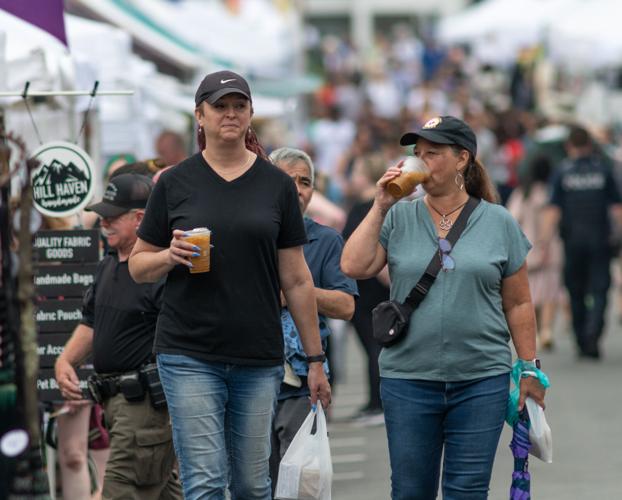 IN PHOTOS: A rainy scene at annual Occoquan RiverFest and Craft Show ...