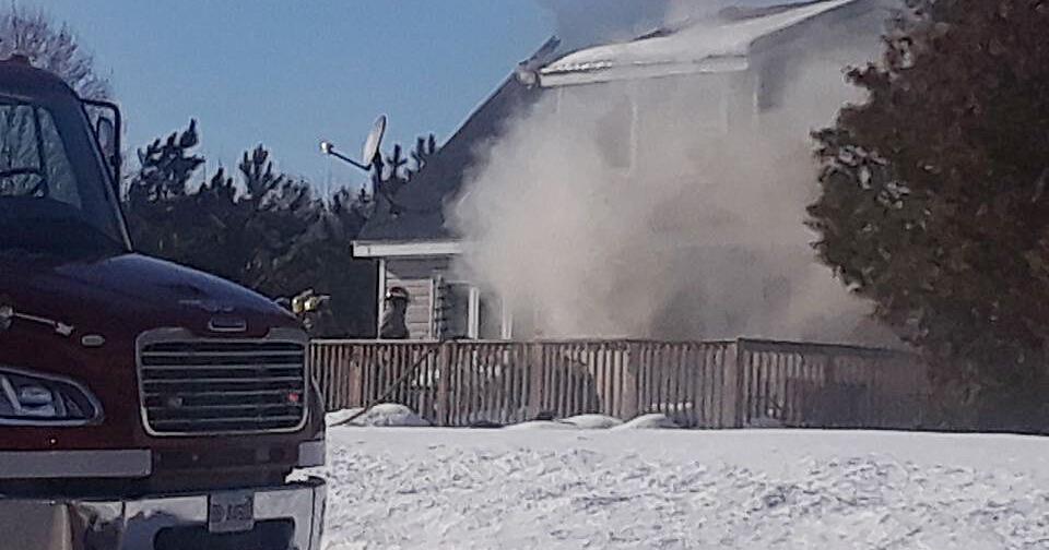 Firefighters battle Whitewater Region house fire