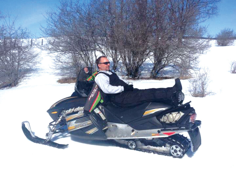 Man dies in snowmobile accident