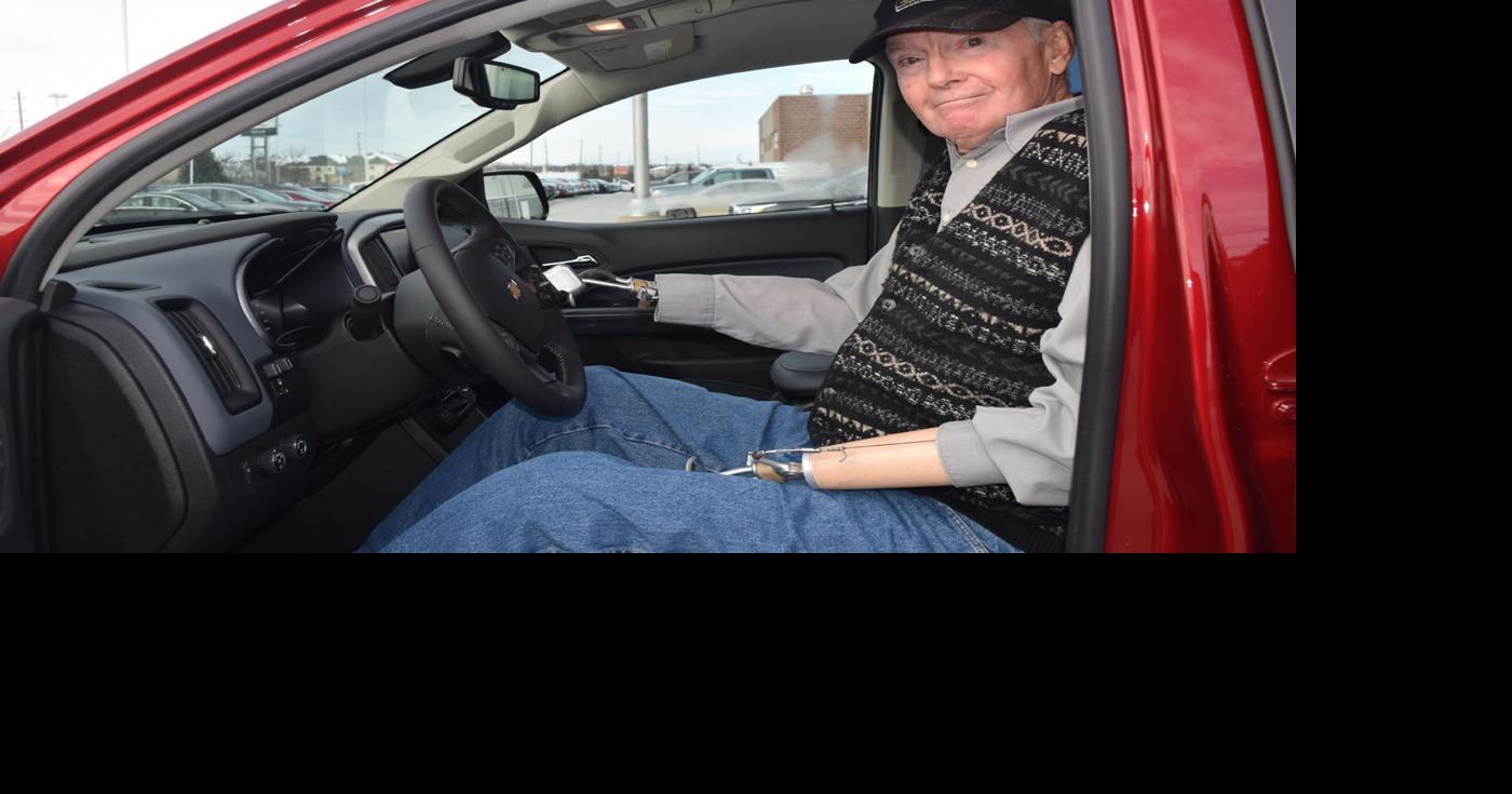 Man who lost both arms in farming accident receives special gift from GM