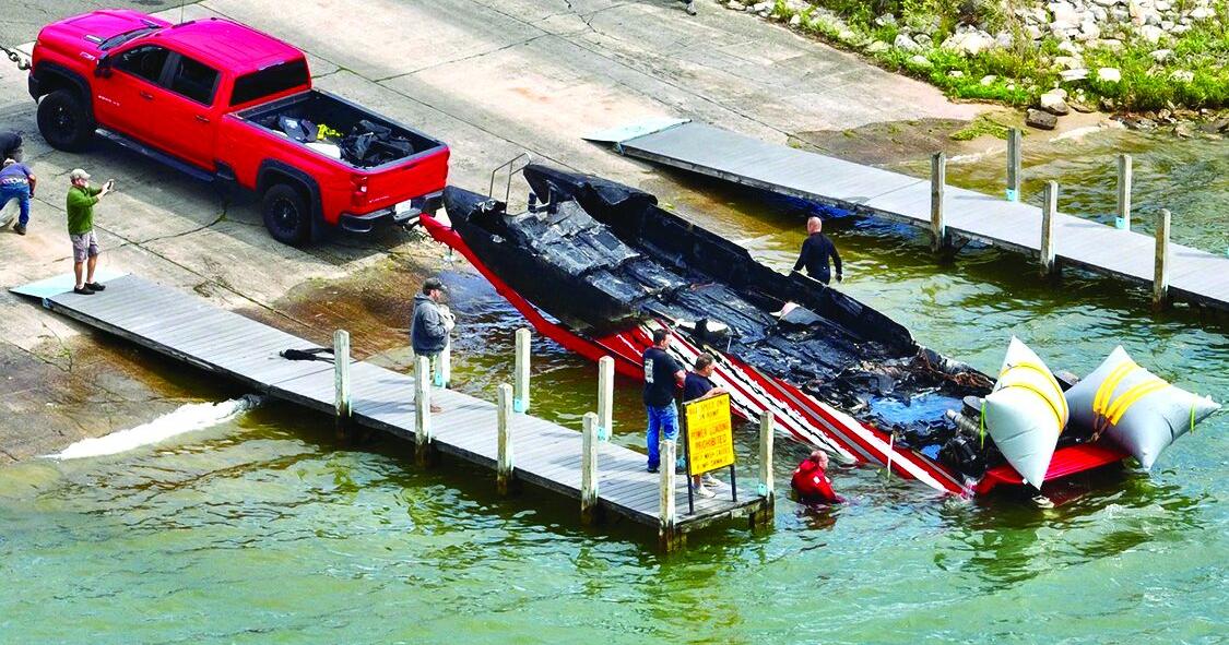 Boat retrieved from water after catching fire, sinking in Tawas Bay ...
