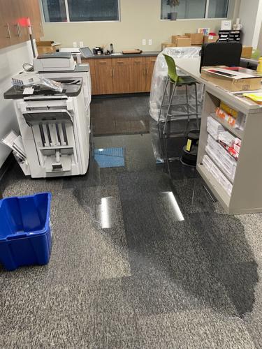 Cambridge Library cleaning up and drying out after rain floods building ...