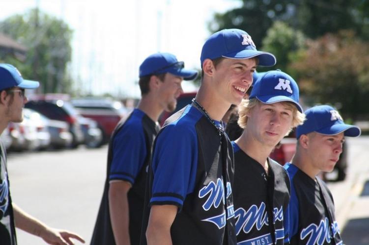 Mora catches tournament fever; parade sends off baseball team ...