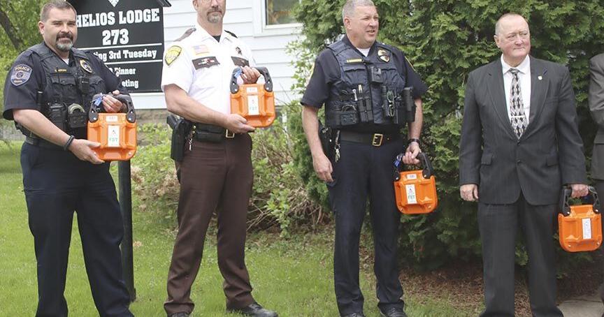 Helios Lodge donates fire suppression tools to police, sheriff | News ...