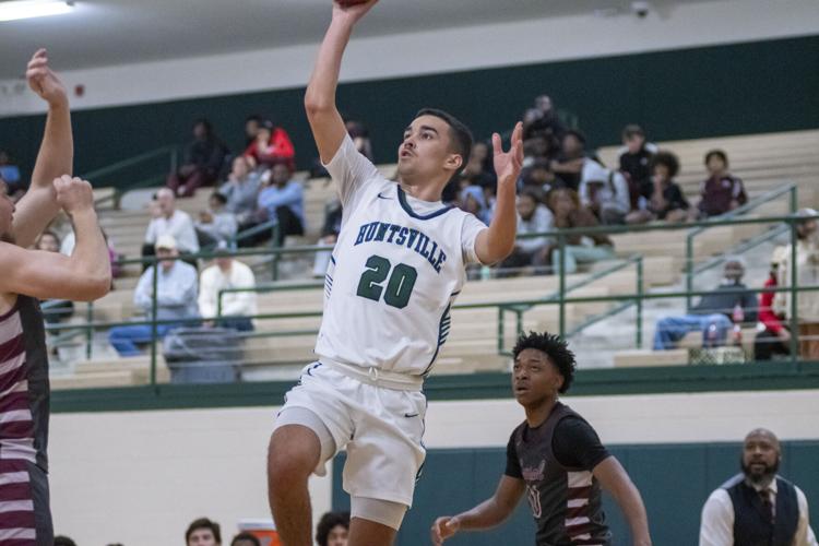IN PHOTOS: A&M Consolidated hands Huntsville its first district loss ...