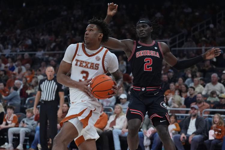 Texas rallies to beat No. 21 Georgia 87-67 behind Swain's 26 points ...