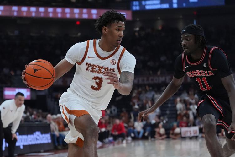 Texas rallies to beat No. 21 Georgia 87-67 behind Swain's 26 points ...