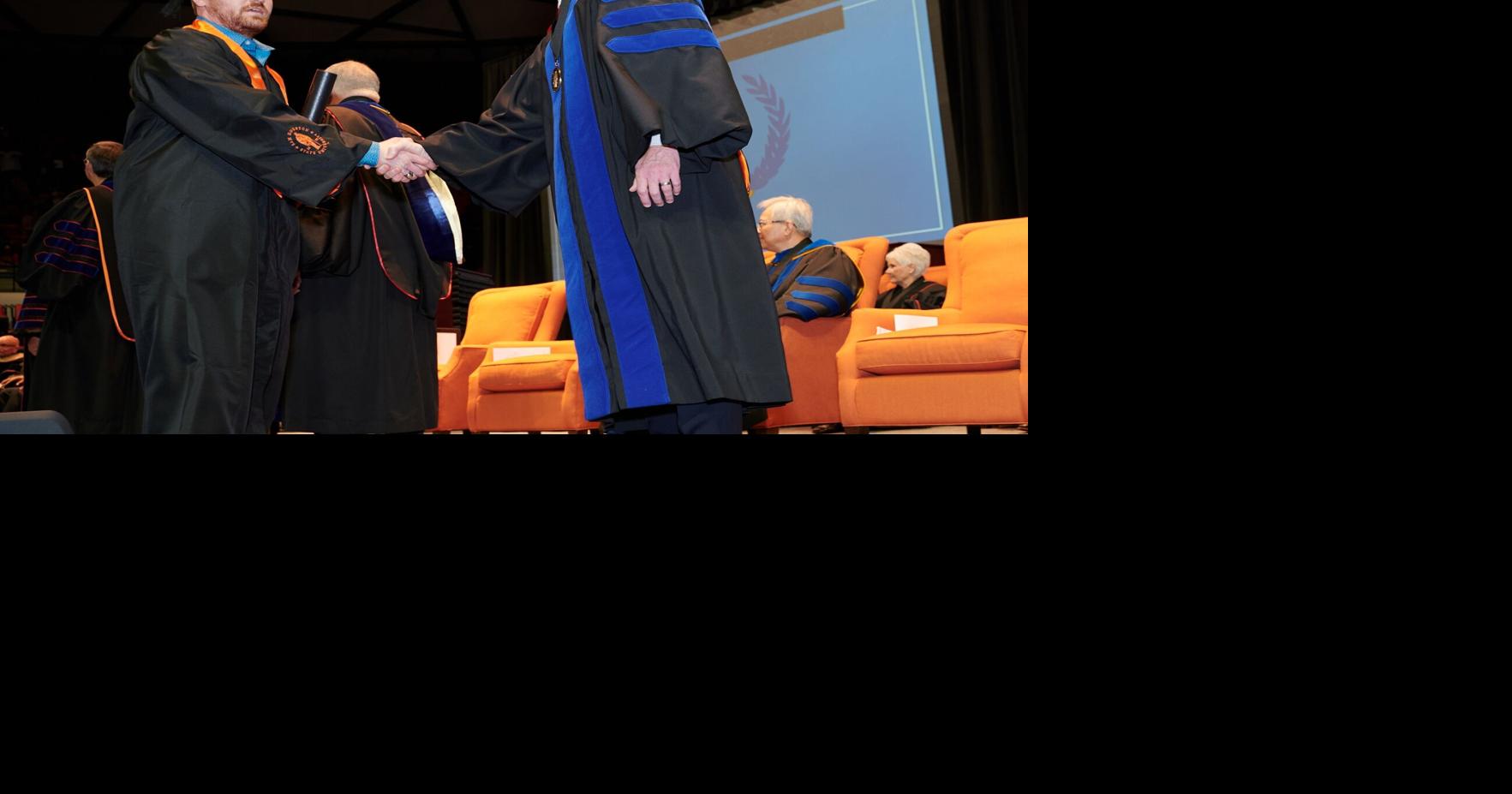 Firefighter beats odds and walks across graduation stage at SHSU | News ...