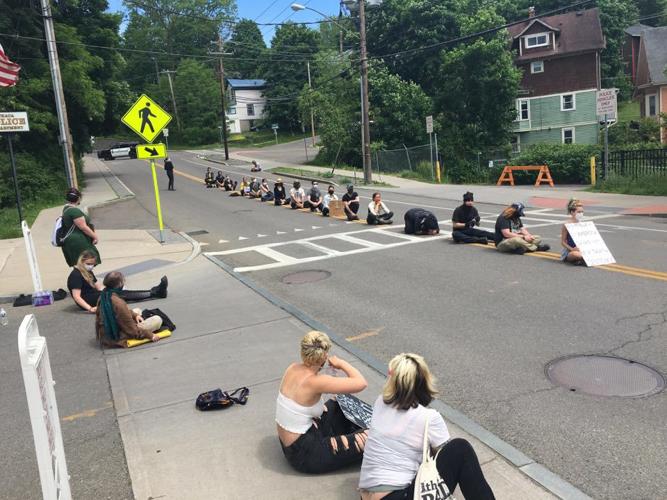 Cars break line at downtown protest event, two hurt | Ithaca | ithaca.com