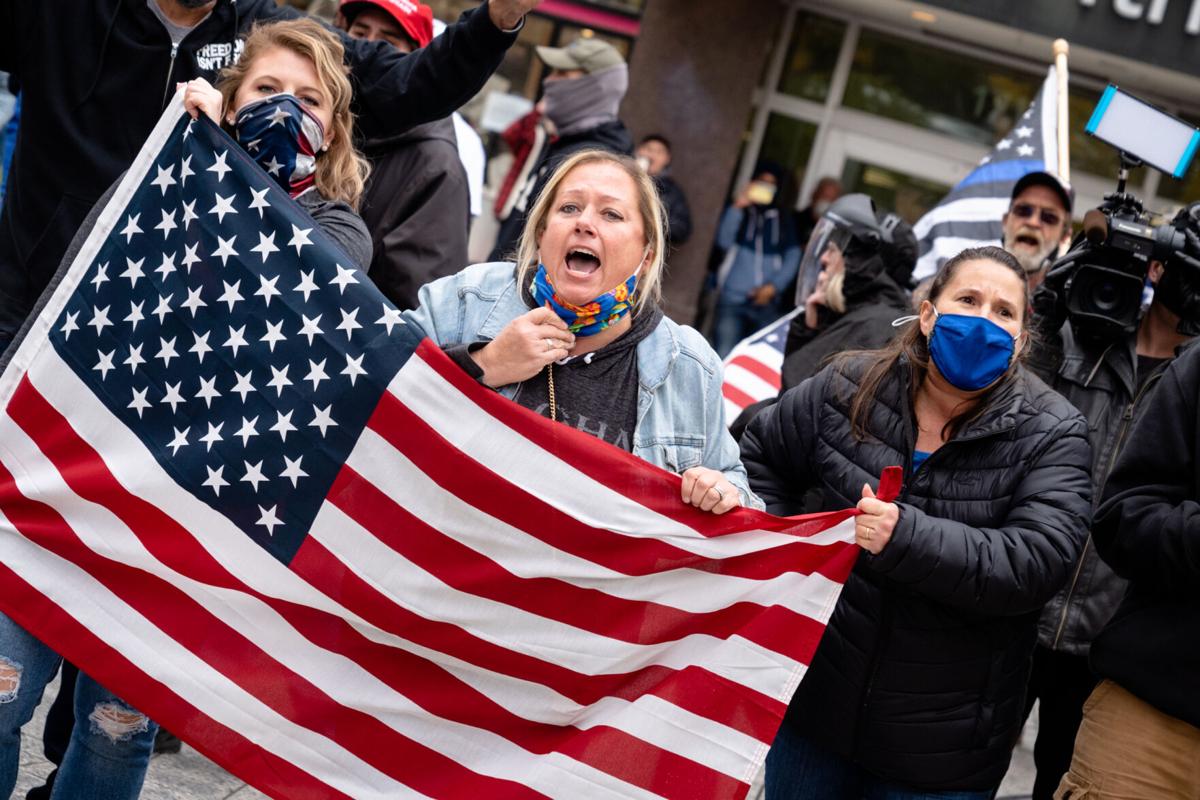 Hundreds show up in opposition to Back the Blue protest, Proud Boys ...