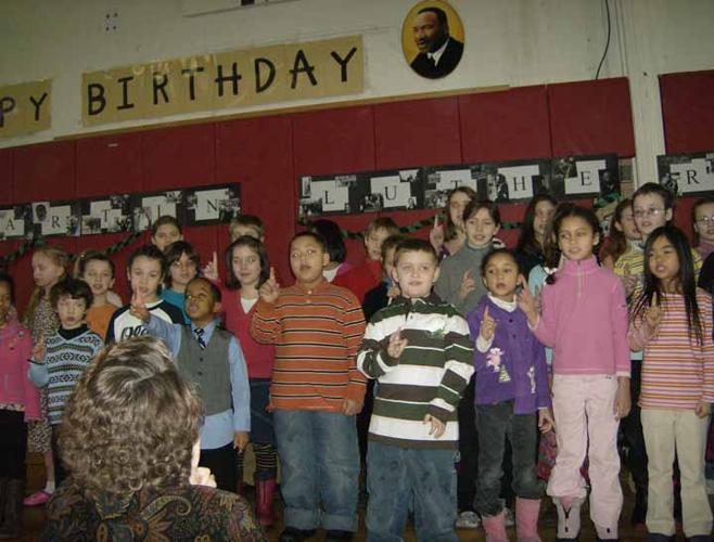 Ithaca community celebrating Martin Luther King Jr. Day with emphasis ...