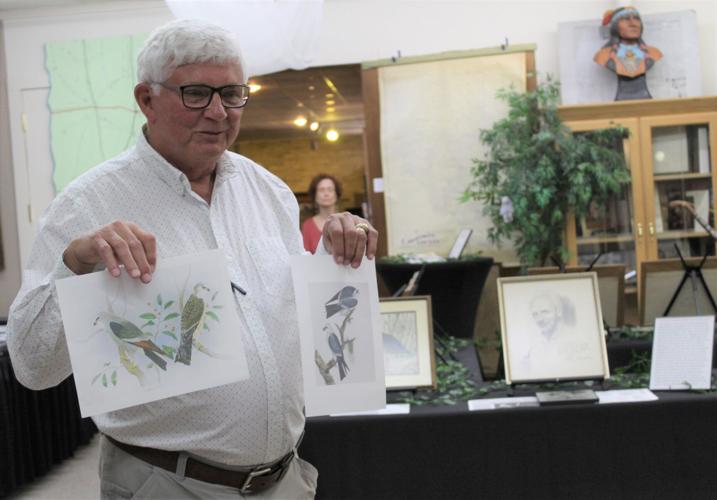 Art takes flight: Watercolor painter Rex Brasher’s artwork opens to ...