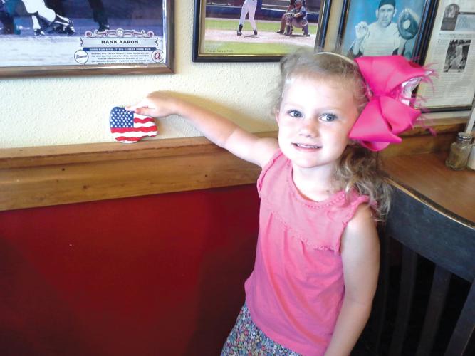 Sharing smiles, one painted rock at a time | News ...