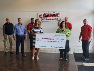 Photo: Crime Stoppers celebrate anniversary with donation ...