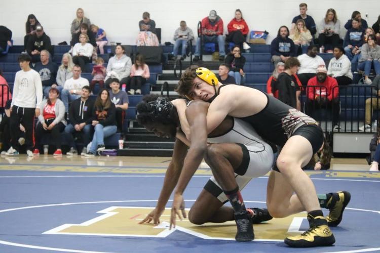 Dixon's Justin Root earns 100th wrestling win during Marine father's ...