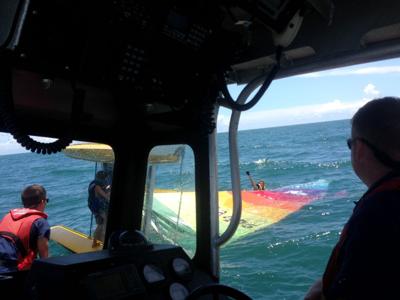 Coast Guard helps two after catamaran capsizes | News | jdnews.com