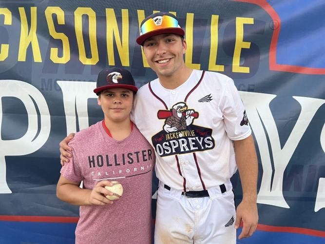 Catching friends: Jacksonville Ospreys' Chris Hawkins forms bond with ...