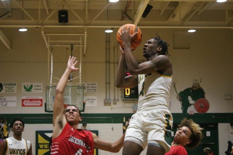 White Oak boys' basketball looks ahead to Croatan after another win ...