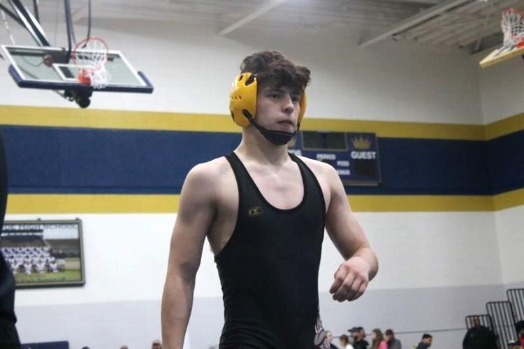 Dixon's Justin Root earns 100th wrestling win during Marine father's ...