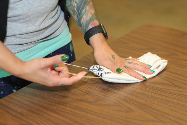 Photos: Onslow library staff make masks for those on the front lines ...