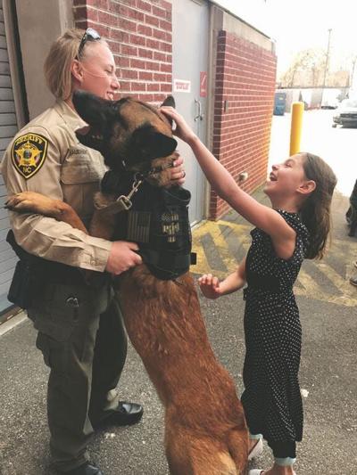 Young girls help donate bite suit to OCSO K-9 Unit | Features | jdnews.com