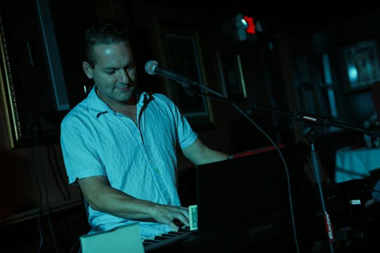 PHOTOS: Adam Barbour and Greg Cloninger perform at Dueling Pianos ...