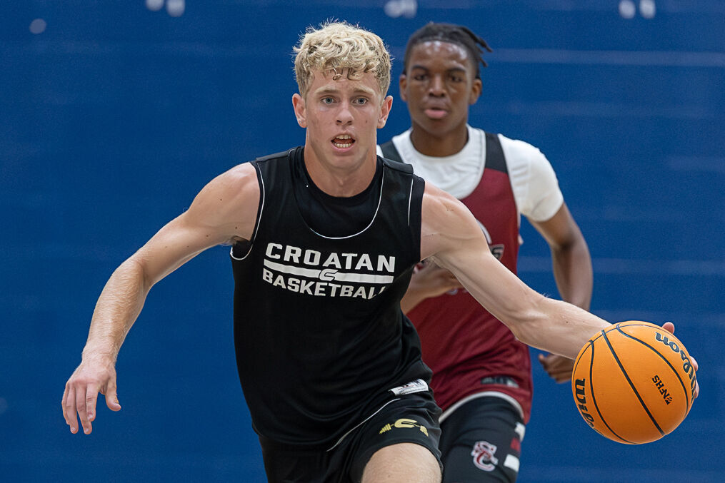 Croatan's McBride still balances football & basketball even at East ...