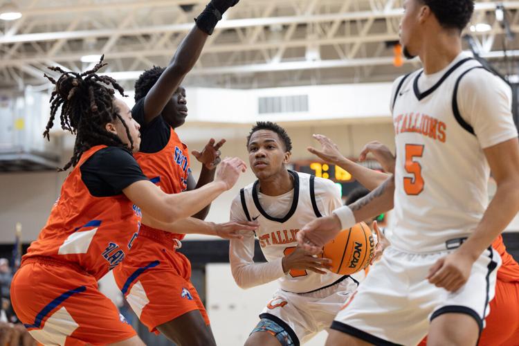 PHOTOS: Southwest boys' basketball tops Southeast Alamance in second ...
