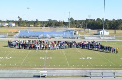 Second annual Fishstrong movement floods Northside football field ...