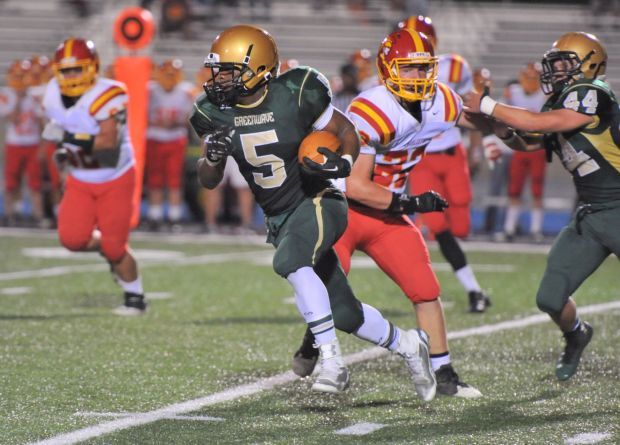 Armstrong's career night leads Green Wave over Trojans