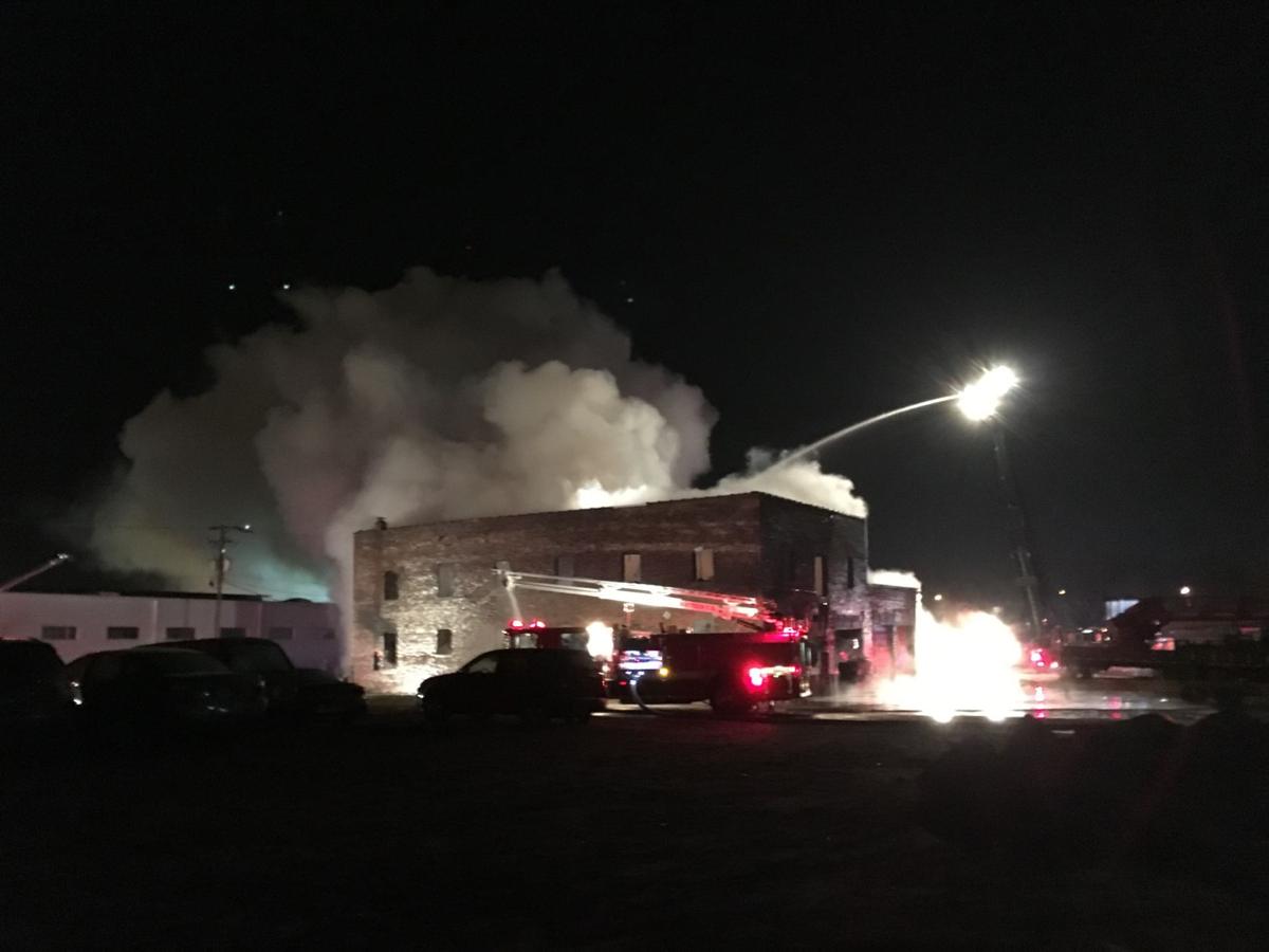 Firefighters spend hours battling warehouse blaze