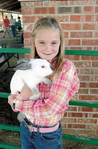 Rylee McKinney shows top rabbits