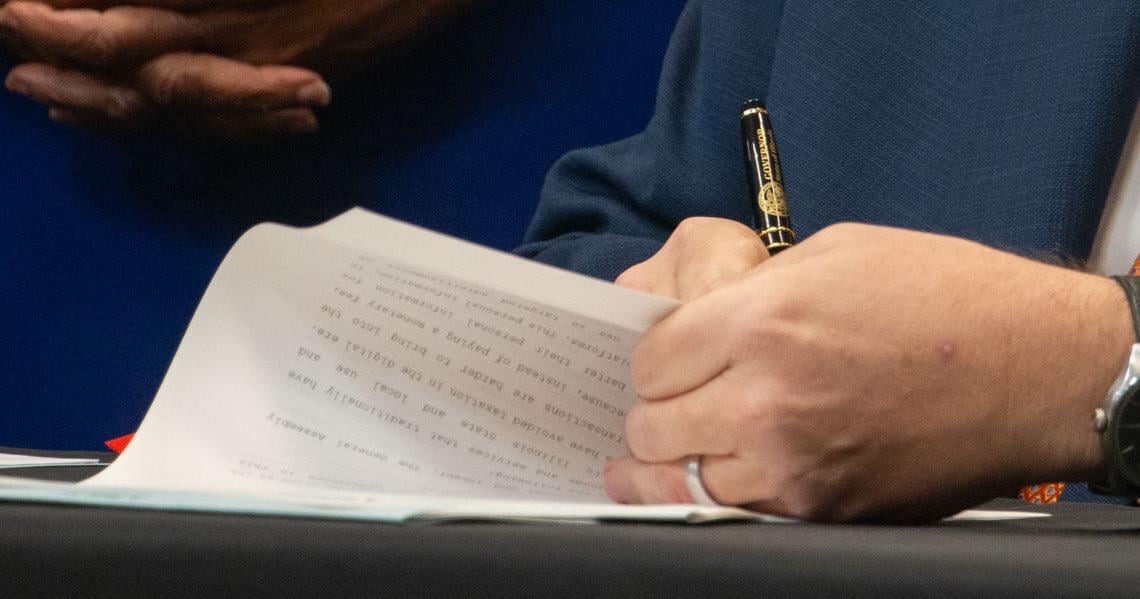 Pritzker signs bills on environmental standards, in-state tuition