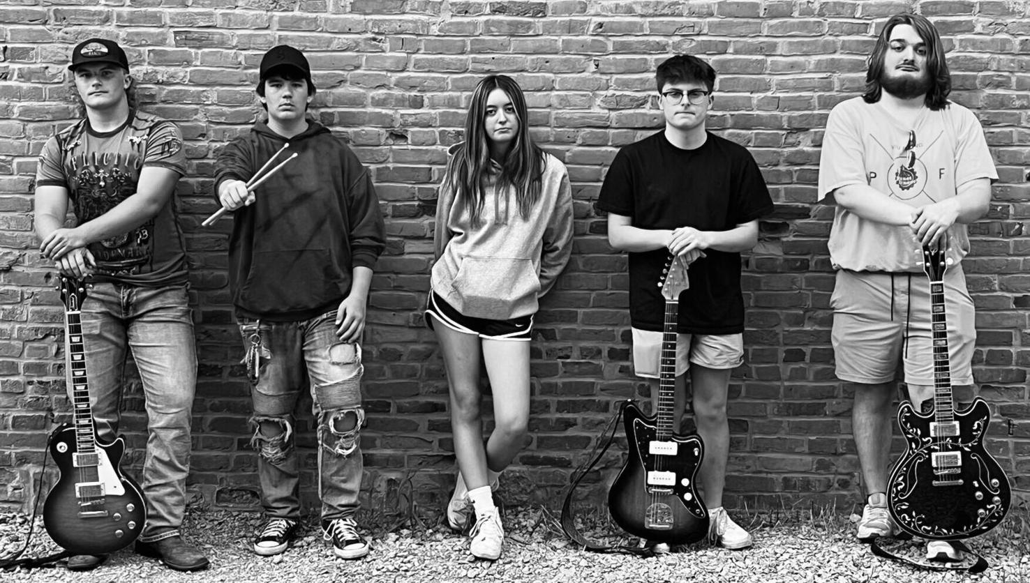 Mattoon student musicians playing multiple roles at Band Aid ...