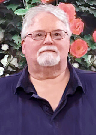 Dennis Michael "Mike" Reed