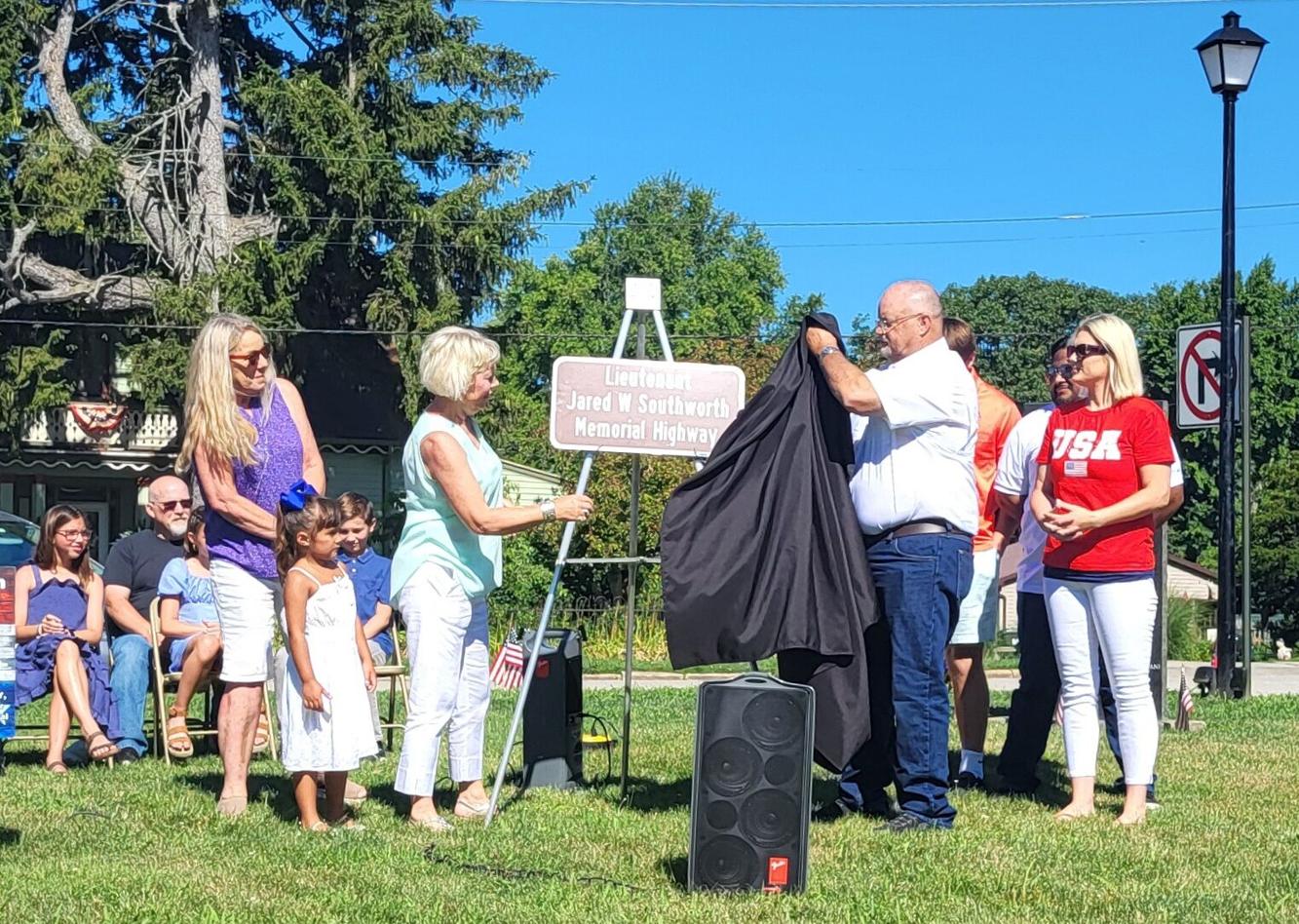 Memorial road sign unveiled for fallen Oakland soldier