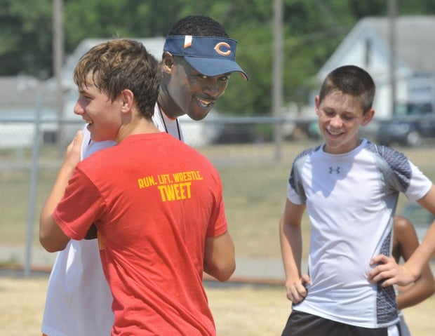 Ray McElroy's Christian-based football camp seeks more than wins