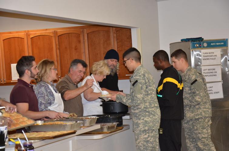 Family cooks food for son's Army platoon