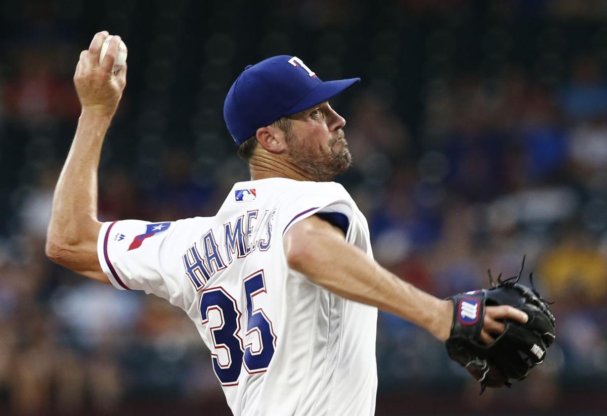 AP source: Cubs get LHP Cole Hamels in trade with Rangers