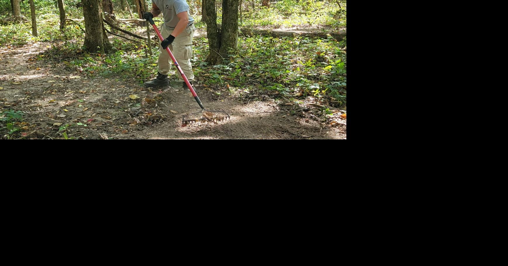 AmeriCorps team creating trails at Lake Paradise in Mattoon